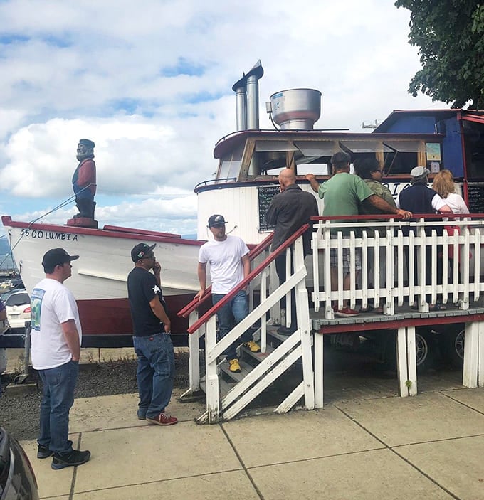 People actually climbing stairs to order from a boat proves this fish is worth the extra effort.