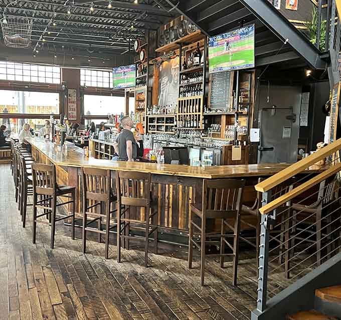 That wraparound bar is where beer education happens one pour at a time, no textbooks required.