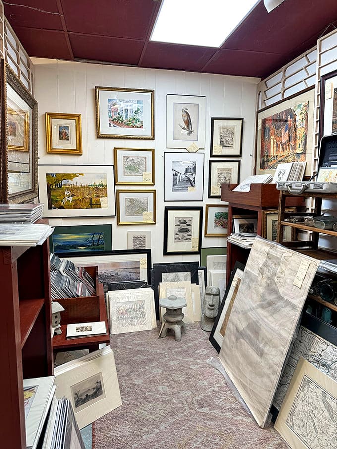 Maps, prints, and artwork stacked like a curator's dream, each piece a window into another era entirely.