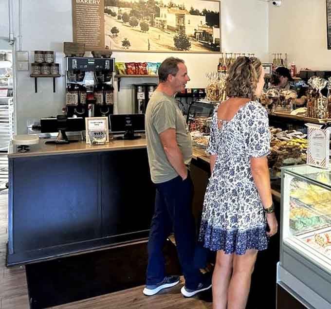 The counter where magic happens and difficult decisions about pastries are made with surprising seriousness and joy.