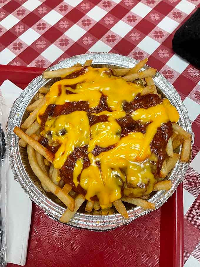 Chili cheese fries that don't apologize for being exactly what they are: a glorious mess of crispy potatoes, savory chili, and cheese that stretches for days.
