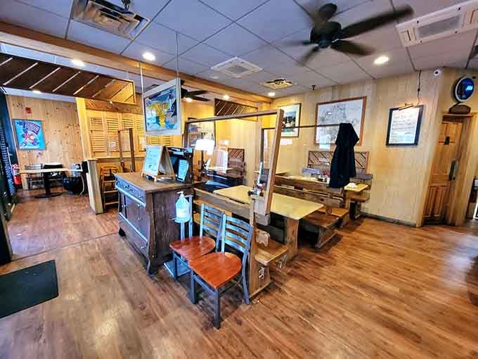 The dining room's warm wood tones and comfortable seating invite you to settle in and stay for another round.