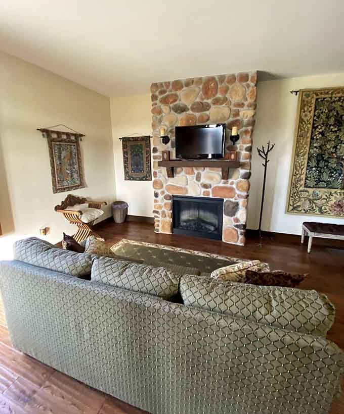 Cozy living spaces blend stone accents with comfortable furnishings, proving castles can feel like home sweet home.