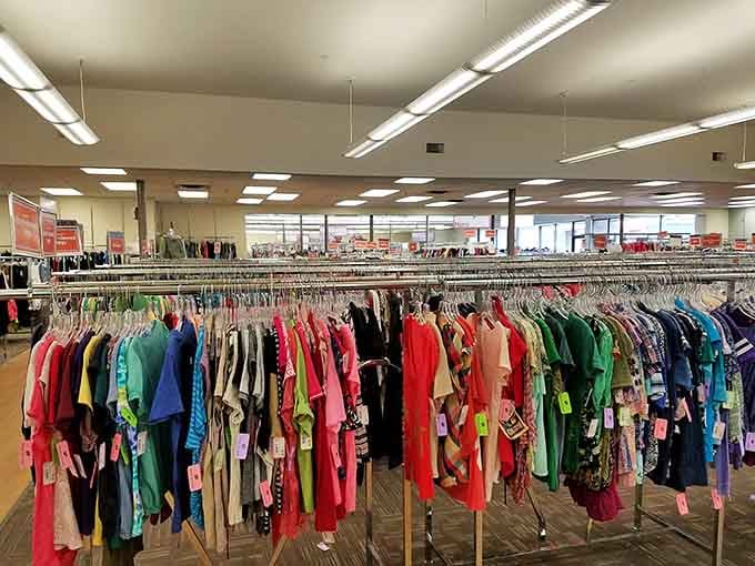 A rainbow of clothing options stretches across the store, organized by color to make your treasure hunt surprisingly efficient.