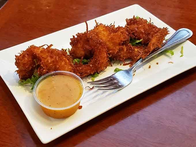 Coconut shrimp with the perfect crunch-to-juice ratio. These golden beauties are what would happen if a tropical vacation became an appetizer.