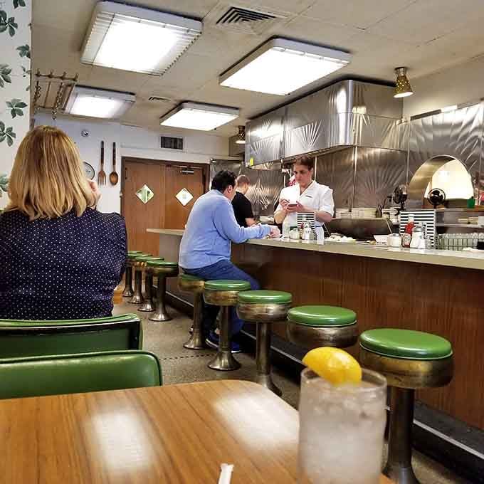 The counter service area offers a front-row seat to the kitchen ballet&mdash;where regulars exchange news while waiting for their spaghetti fix.