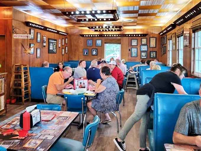 A dining room where strangers become neighbors, united by the universal language of "mmm" and "pass the sauce, please."