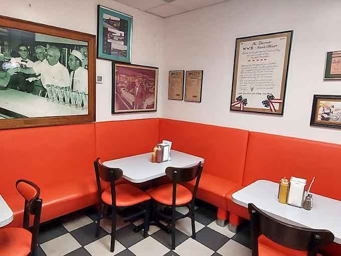 Orange vinyl booths and vintage photos create a time capsule where calories don't count and memories are made.