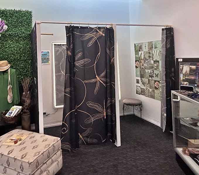 Those fitting room curtains with elegant dragonfly patterns add a touch of class to trying on your treasures.