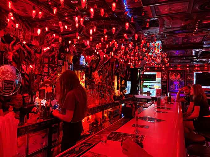 Hanging glassware creates a sparkling canopy above bartenders who've seen it all and then some.