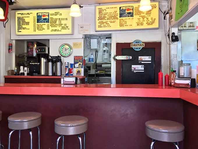 Chrome stools and red counters create that authentic diner vibe where calories don't count and memories get made.