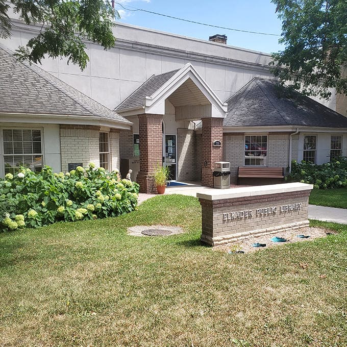 The Elkader Public Library welcomes readers with hydrangea-flanked charm &ndash; because the only thing better than a good book is a beautiful place to discover it.