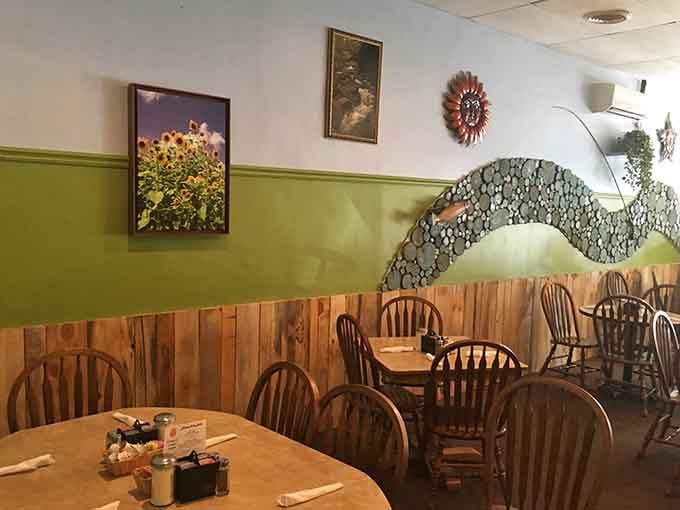 That artistic stone river flowing across the lime green wall adds mountain charm to every bite you take here.