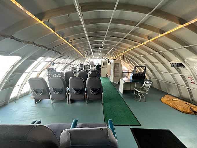 The curved fuselage interior shows where passengers once sat, probably wondering if flying in a metal tube was truly safe.