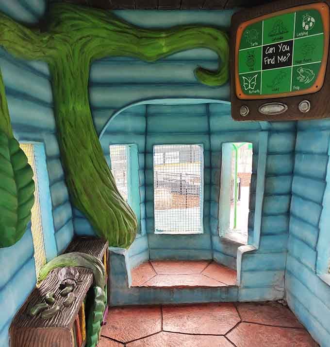 Interactive play panels inside the structure keep curious minds engaged while little legs take a breather.