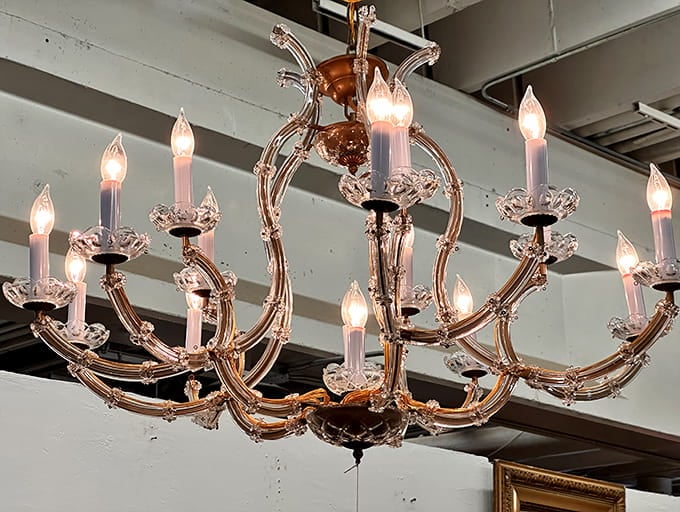 This chandelier screams elegance and "I hope your ceilings are tall enough for my dramatic personality."
