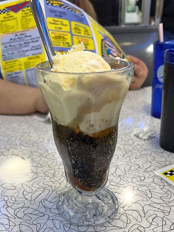 The root beer float arrives like a science experiment gone deliciously right&mdash;ice cream slowly surrendering to soda in a fizzy, creamy dance that defies both time and willpower.