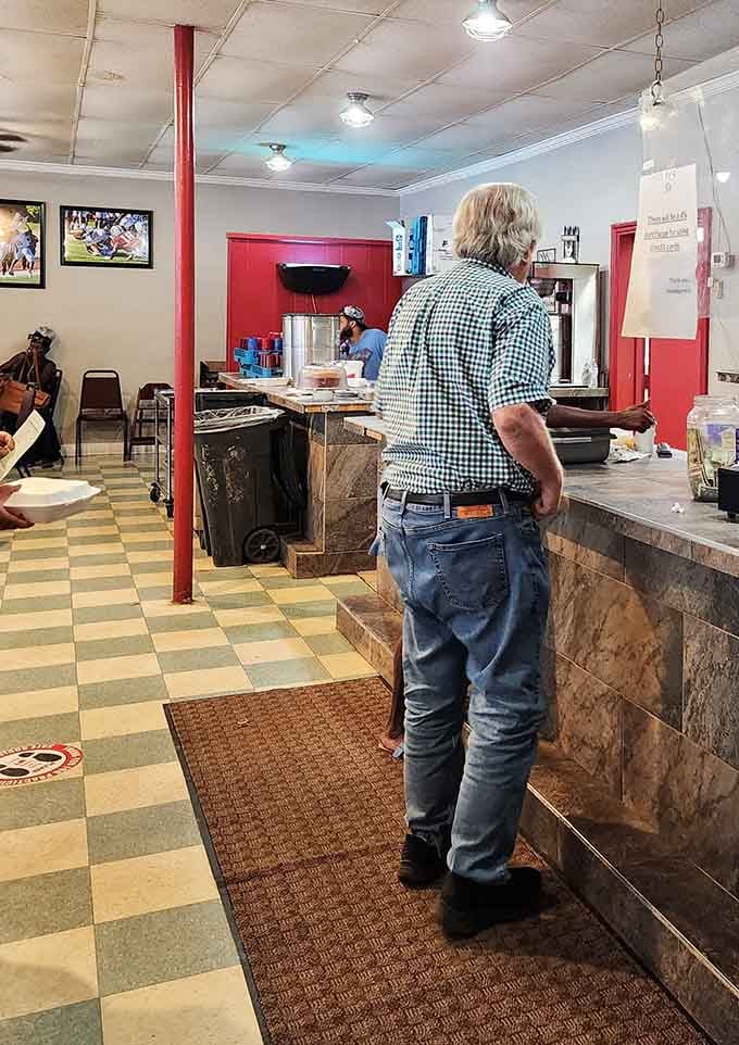 The classic checkered floor and red accents give this place the timeless diner vibe that never goes out of style.