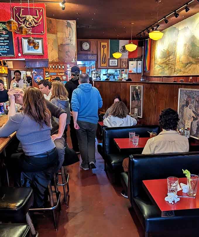 The bar area buzzes with locals who know exactly what they're ordering before they sit down here.