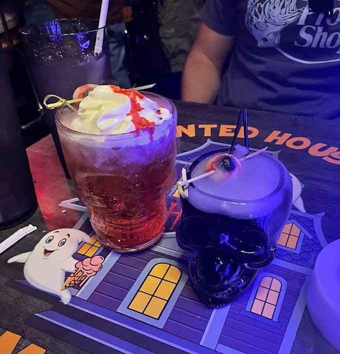 These cocktails arrive in theatrical glassware with whipped cream and garnishes that make you want to Instagram before sipping.