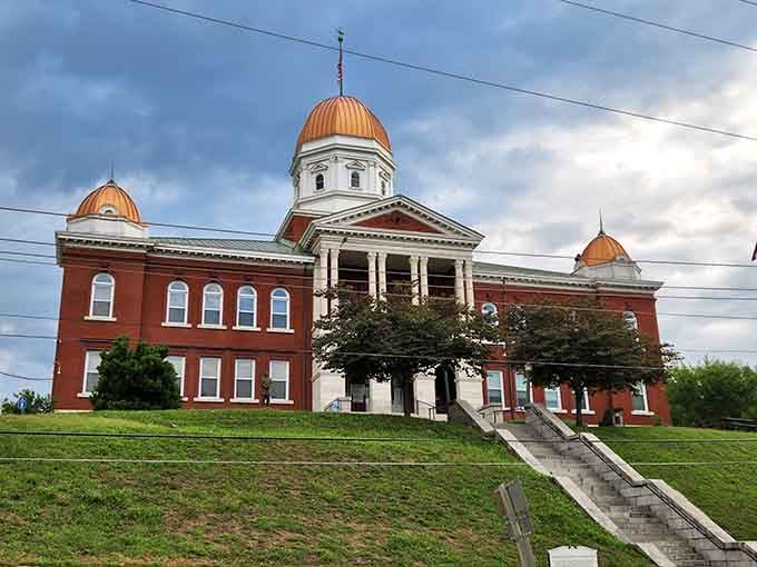 The Gasconade County Courthouse commands its hilltop with copper domes that catch the light like crown jewels.