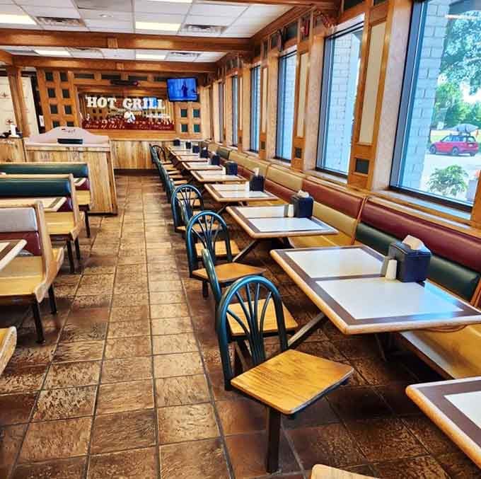 Rows of empty booths waiting patiently for the lunch rush, like actors backstage before the curtain rises.