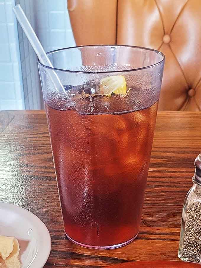 Iced tea so refreshing it could end feuds. That lemon wedge isn't just garnish&mdash;it's the exclamation point on a perfect beverage.