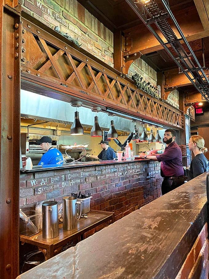 That open kitchen design means you can watch the magic happen while your stomach does happy anticipatory backflips.