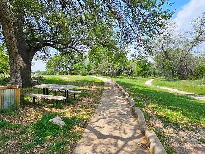 Shaded pathways lead you through the property like nature's own welcome mat, inviting you deeper into paradise.