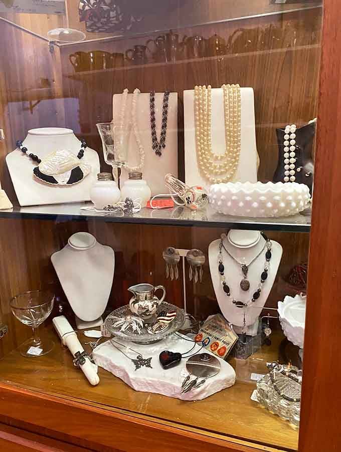 Vintage jewelry displayed like tiny treasures, each piece waiting to add instant elegance to someone's next special occasion.
