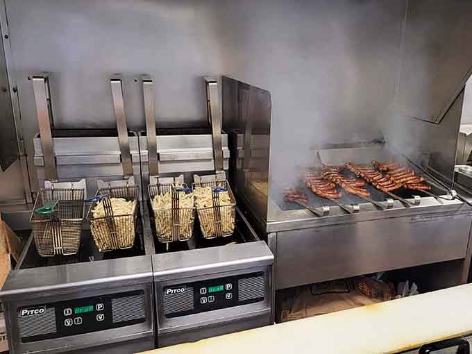 Behind the scenes where the magic happens: fryers ready, grill smoking, and deliciousness being created in real time.