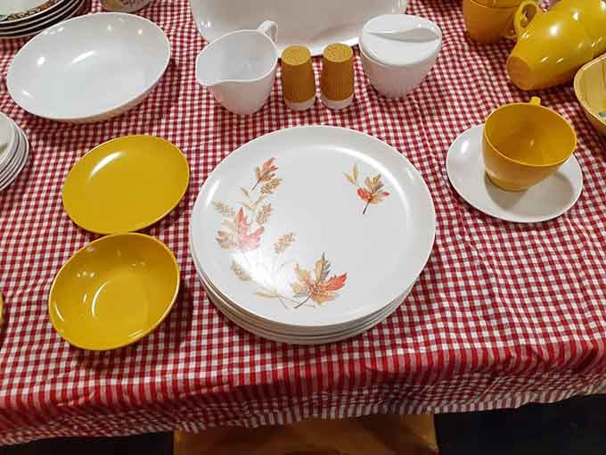 Vintage dishware on gingham that makes you want to host Sunday dinner like your grandmother did.
