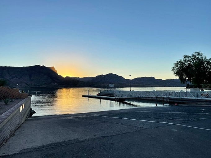 Dawn's golden promise spreads across the marina. Early mornings at Cattail Cove reward early risers with tranquil, glassy waters.