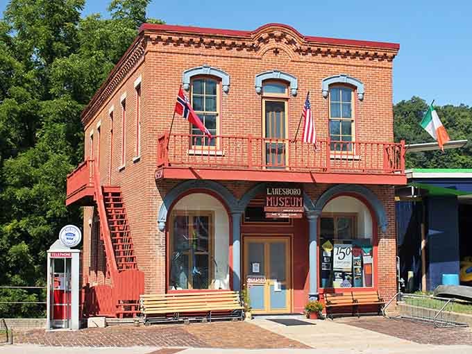 Scanlan Hall's brick facade and ornate details remind you that Lanesboro takes its history seriously, flags and all.