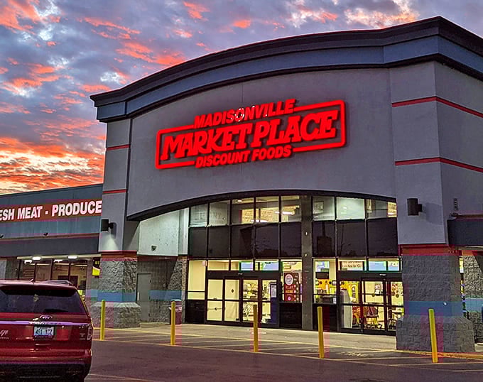 Madisonville Market Place glows at sunset, offering grocery essentials without the premium pricing of trendy urban food halls.