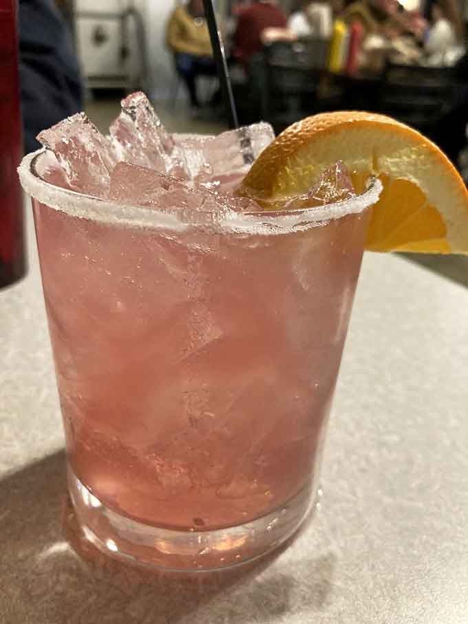 A cocktail that wears its pink proudly, rimmed with salt and promising just enough kick to make dinner interesting.