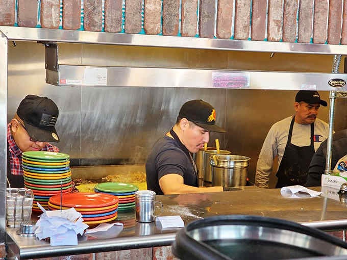 The open kitchen where breakfast magic happens, with colorful plates stacked and ready for action every morning.
