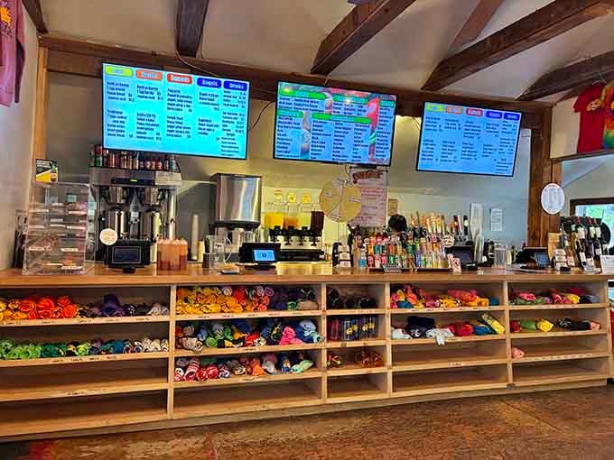 The counter displays climbing gear and snacks together, because why choose between passions?