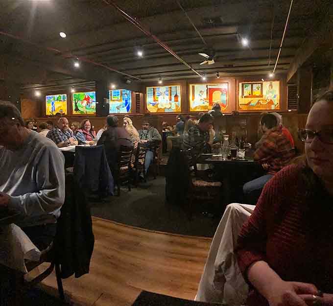 Happy diners enjoying their meals in a space that's witnessed countless celebrations, first dates, and rib-induced food comas.