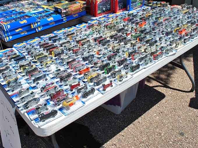 Miniature cars cover tables in precise rows, delighting collectors who remember when Hot Wheels ruled childhood bedroom floors everywhere.