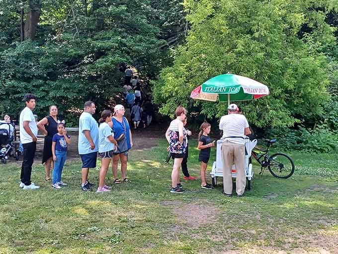 The Italian ice cart draws a crowd because even nature lovers need a cold treat after exploring the glen's wonders.