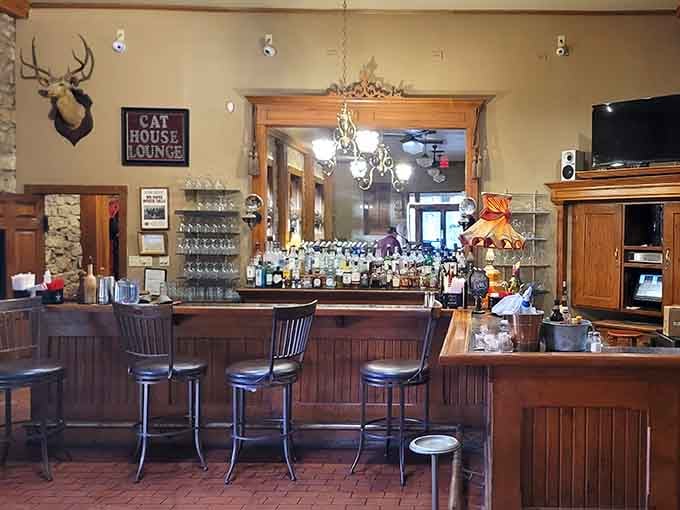 The bar area blends Old West charm with modern comfort, perfect for contemplating life's mysteries over a cold one.