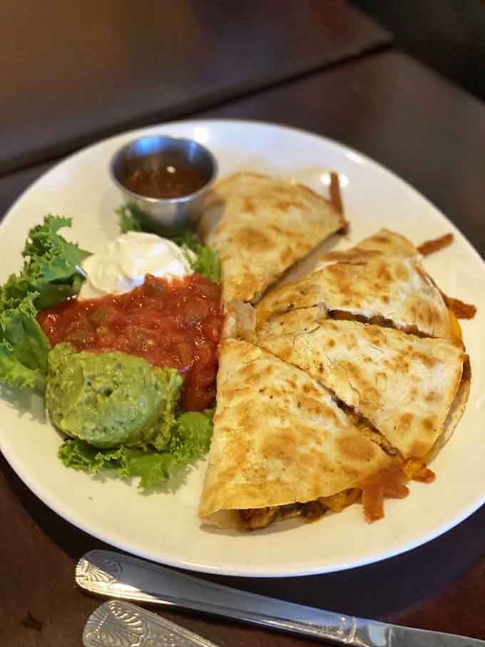 Jerk chicken quesadilla proving that fusion food can be both adventurous and absolutely delicious when done right.