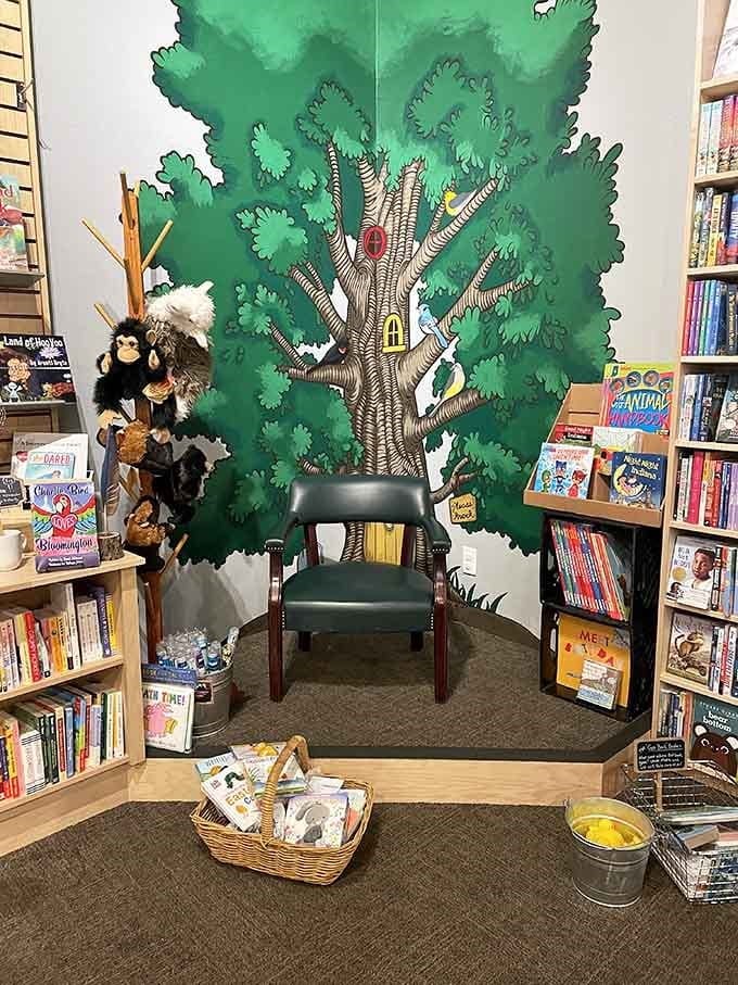 This cozy reading corner with its charming tree backdrop makes every visit feel like childhood again.