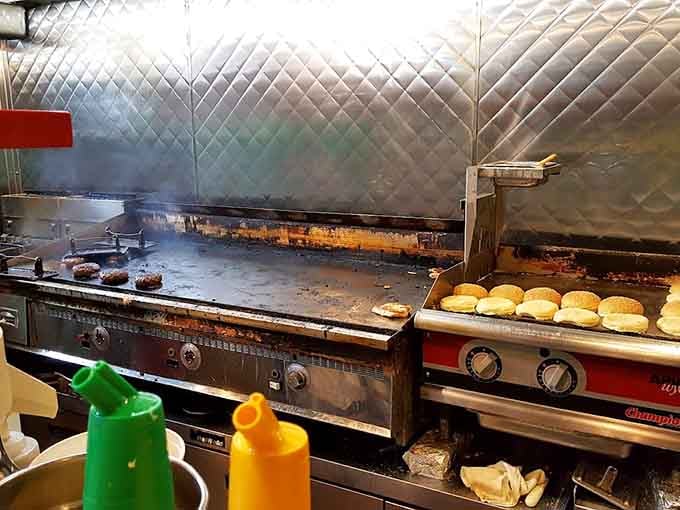 The kitchen where magic happens, one perfectly grilled burger at a time, no fancy equipment required here.