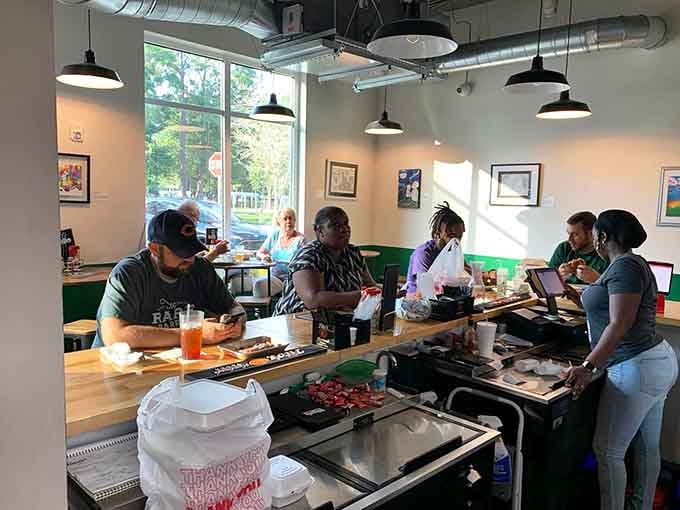 Diners digging into their meals with the kind of focus that tells you everything tastes exactly right.