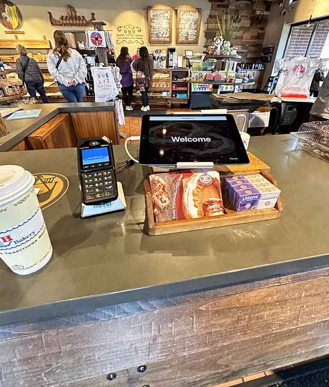 The checkout counter welcomes you with samples and the promise of boxed happiness to go.