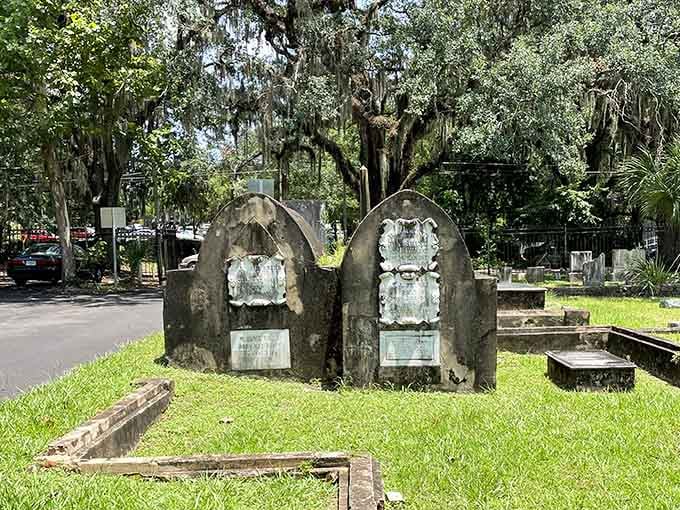 Twin monuments rise like Gothic arches, reminding us that even grief can inspire remarkable artistic expression.
