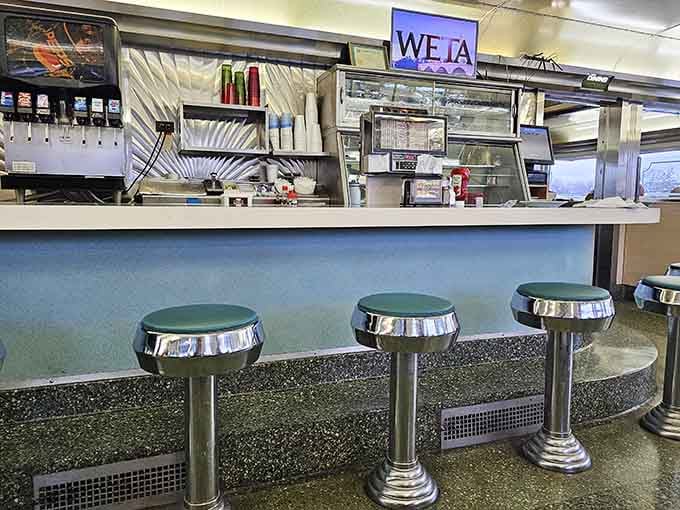 Counter seating where you can watch your breakfast being made, because transparency in cooking builds trust and appetite.