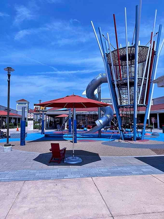 A playground oasis amid shopping madness, where kids burn energy while parents contemplate burning credit cards.